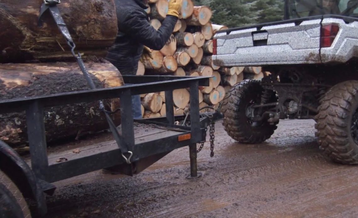 Watch new electric Polaris Ranger UTV tow a fully loaded logging truck ...