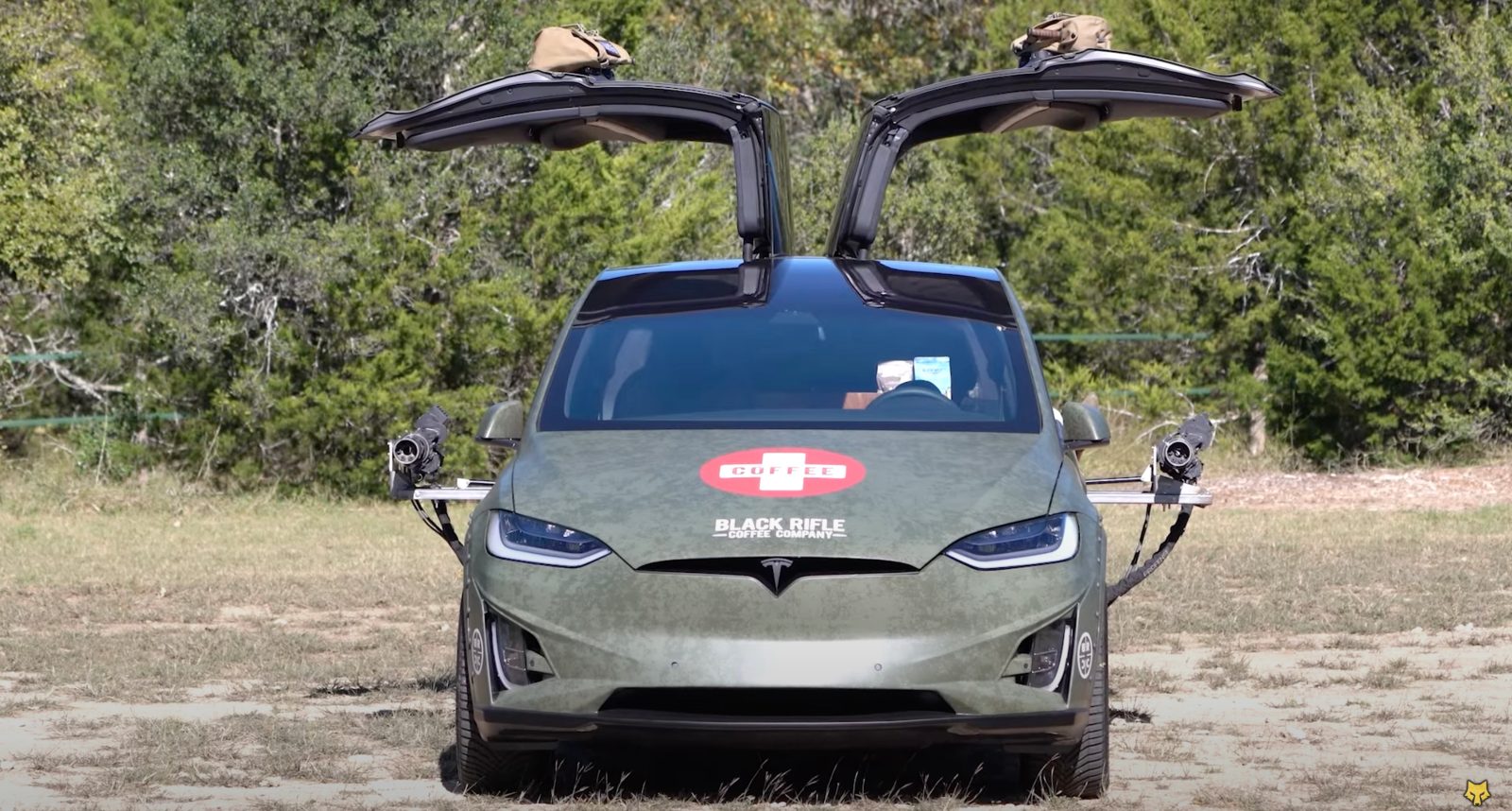 Tesla Model X gets turned into war machine with dual machine guns ...
